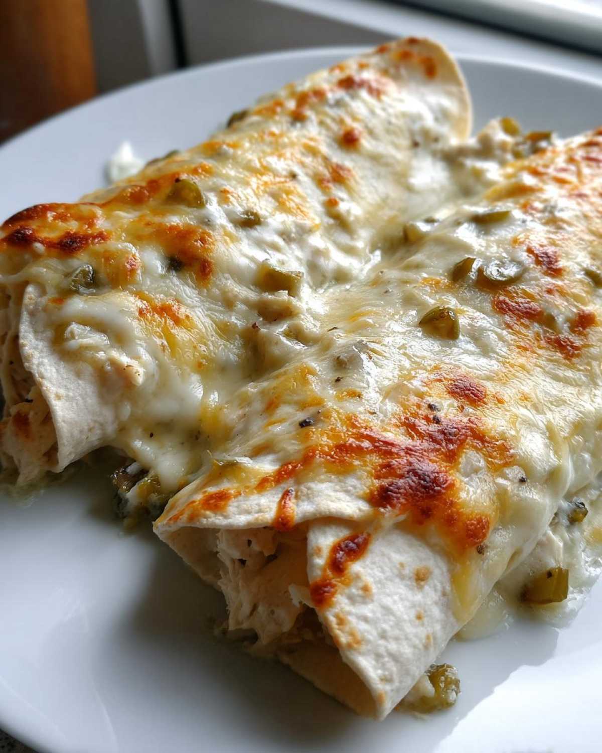 35-Minute Creamy white chicken enchiladas Joy - Whisk Daily